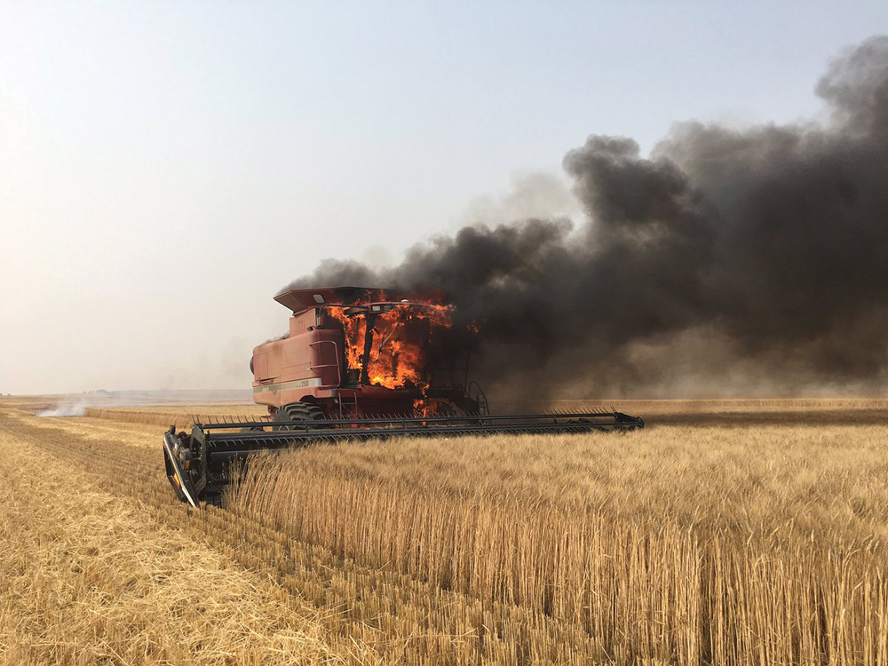Dry season causes combine fire concern - Manitoba Co-operator